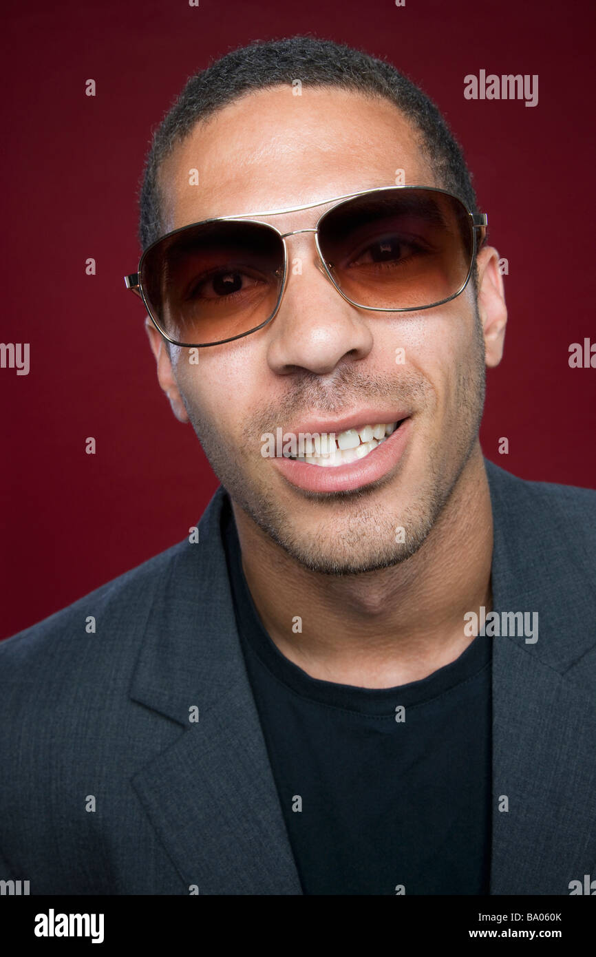Portrait of a man wearing sunglasses Stock Photo - Alamy