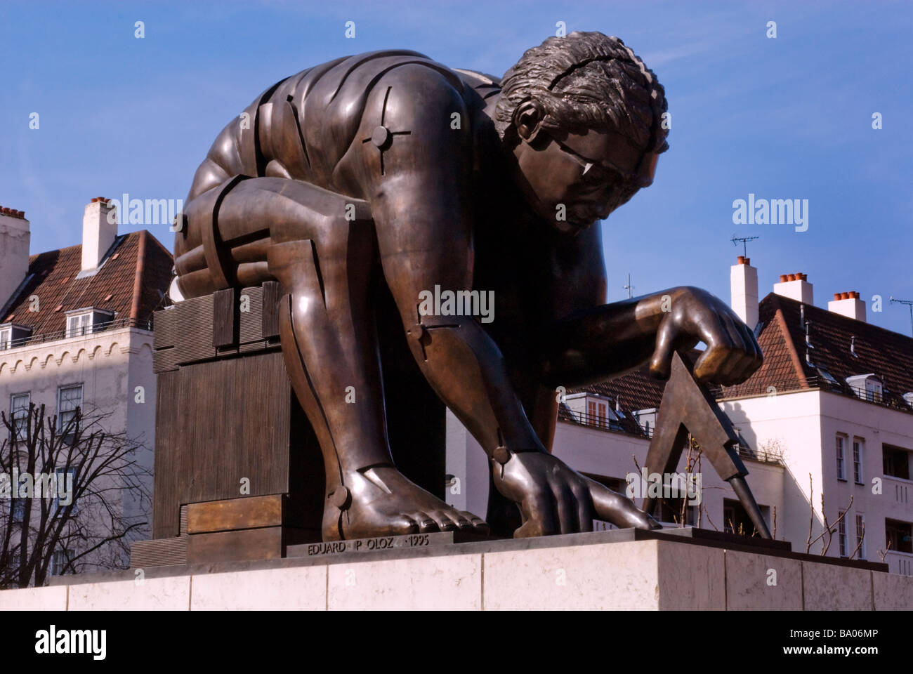 Sculpture of a man with a compass on the plaza grounds of the British ...