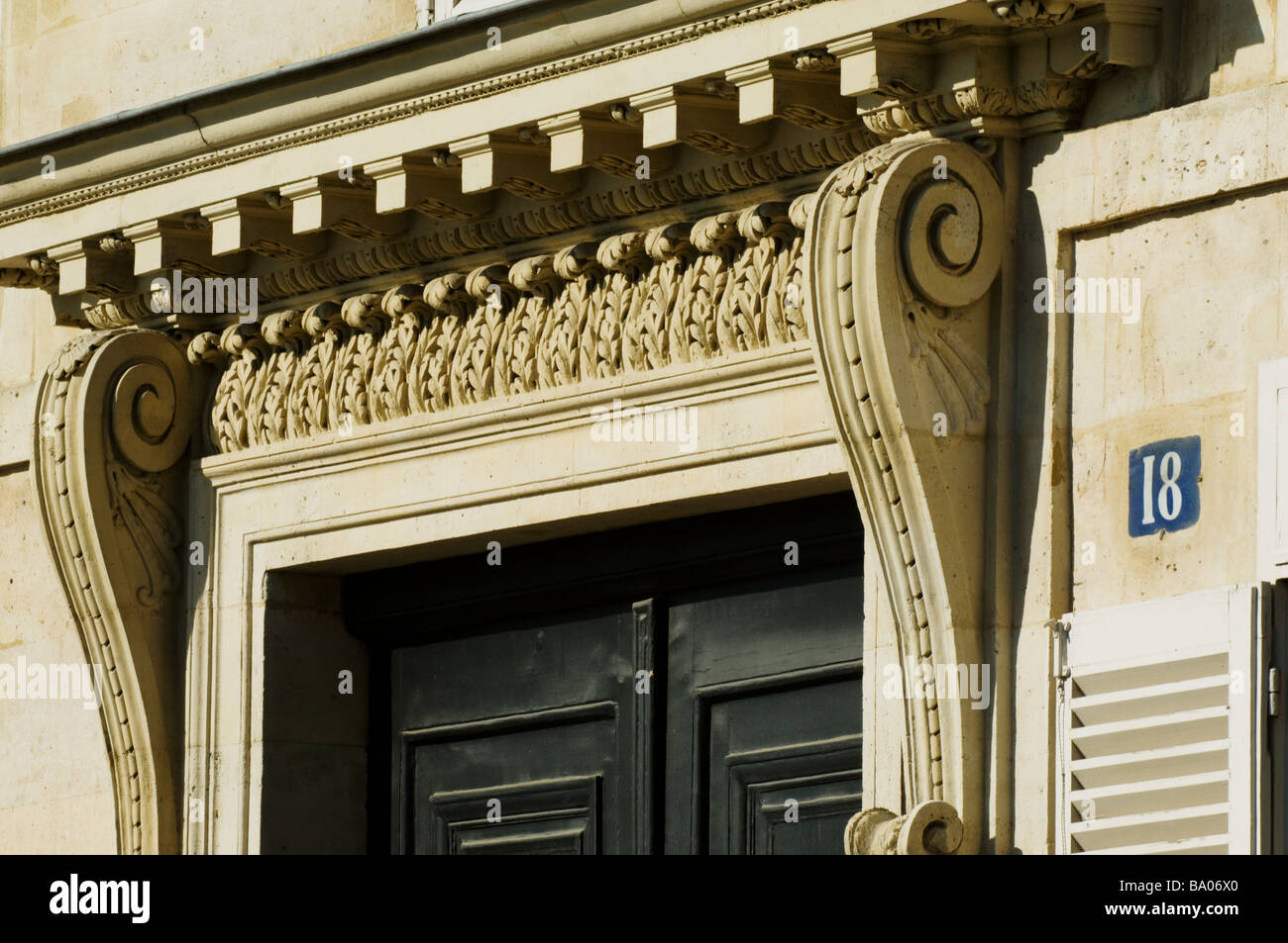 Scroll column architectural detail above a door on the Ile Saint-Louis ...