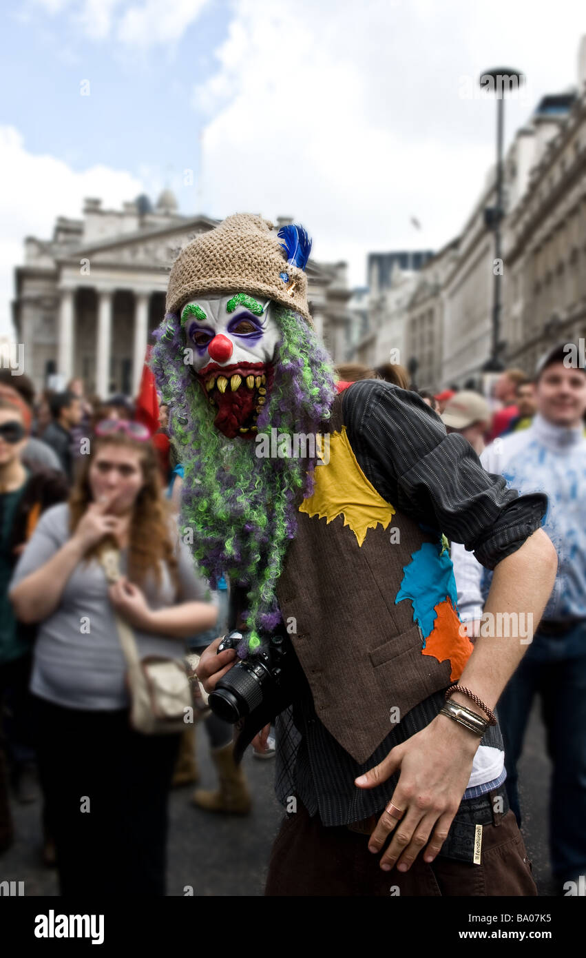 Masked protester at the G20 demonstration in the City of London. Photo ...