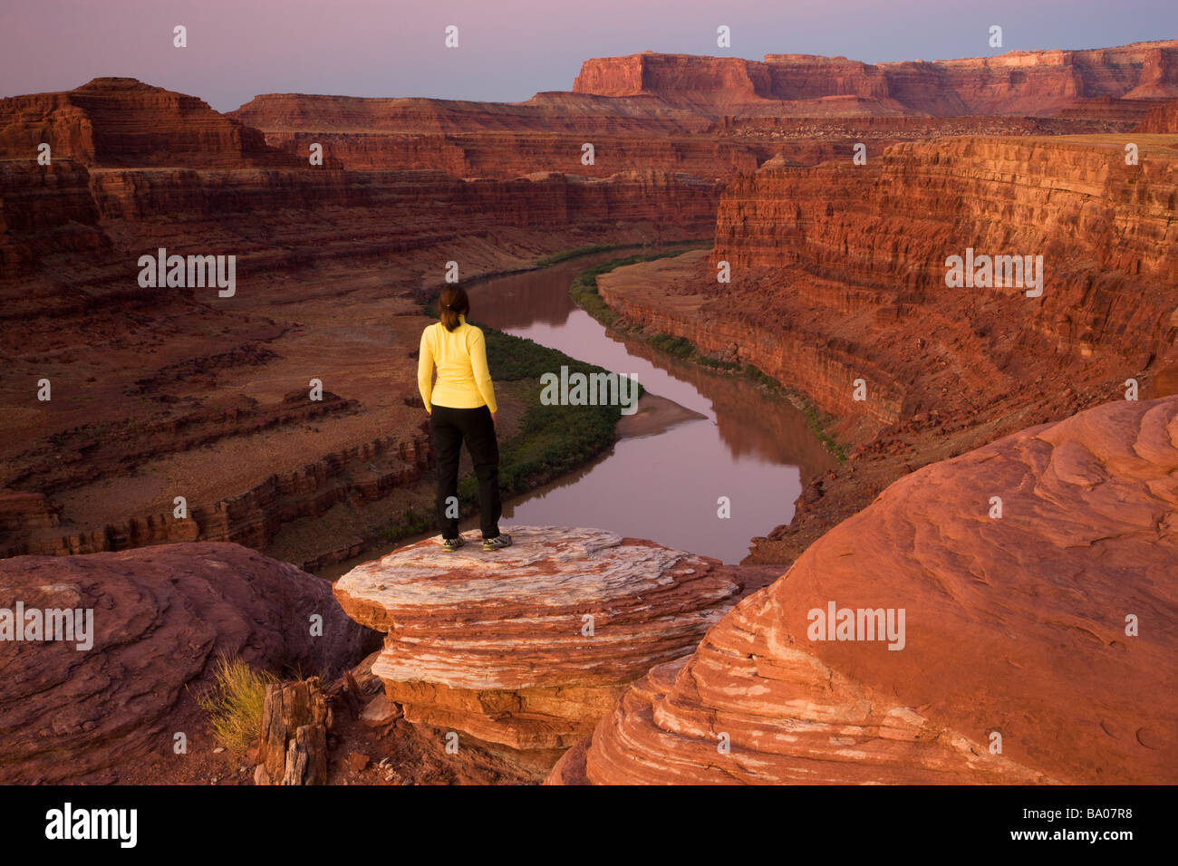 A visitor views the Colorado River from Potash Road Island in the Sky ...