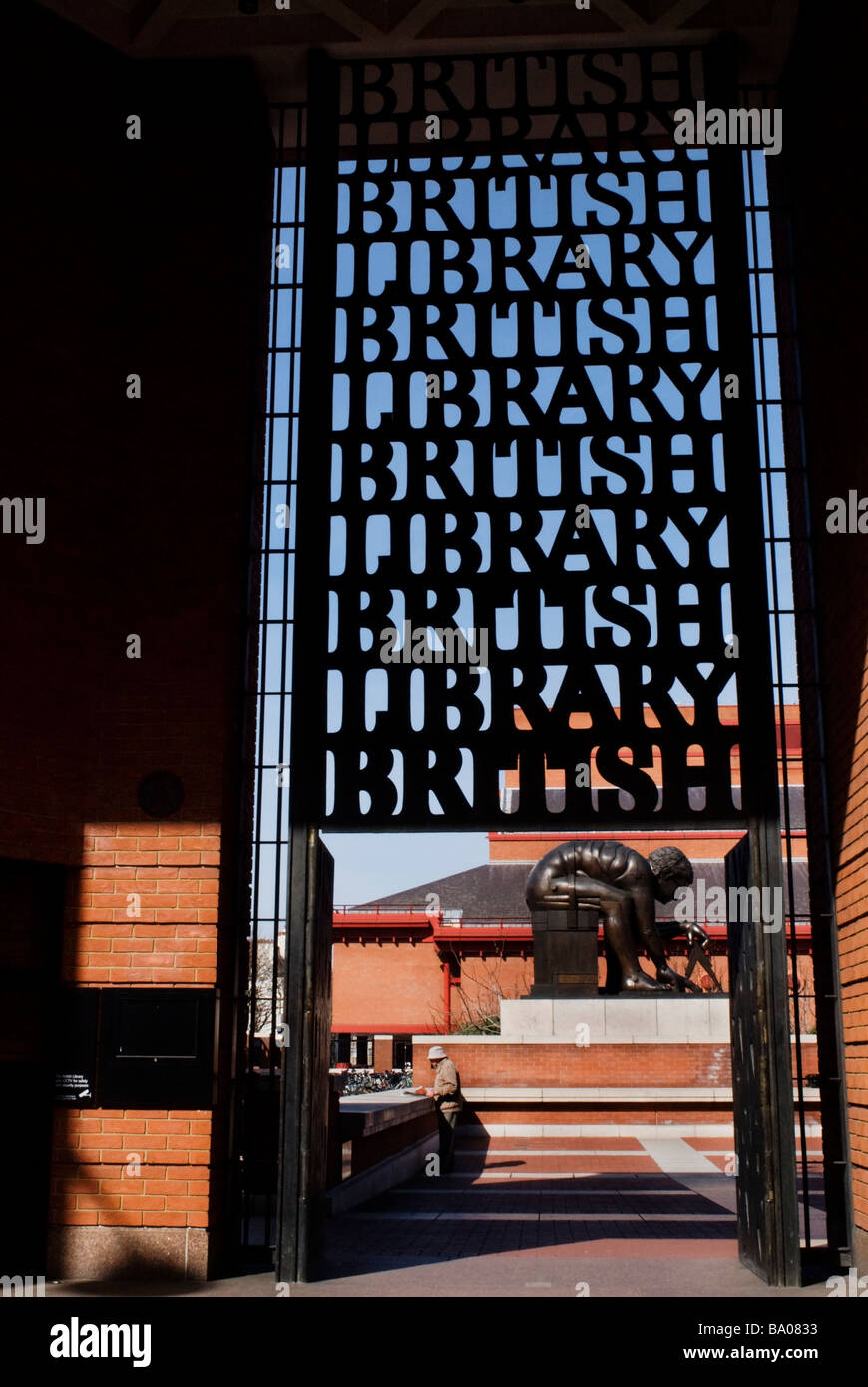 The British Library entrance sign with sculpture in the background ...