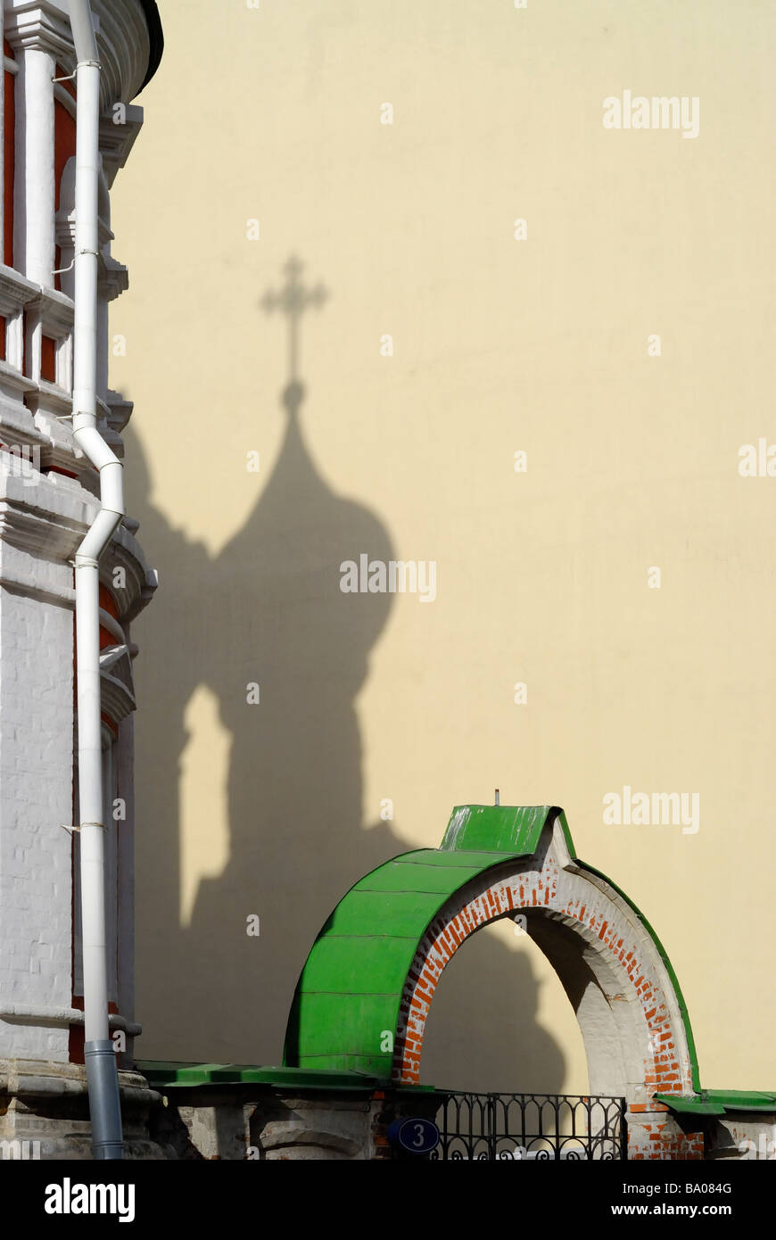 Cross shadows on the building wall Stock Photo - Alamy