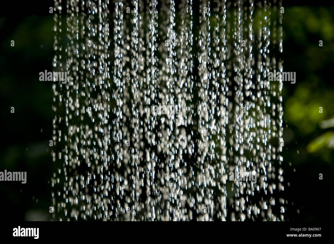 Water streaming down Stock Photo - Alamy