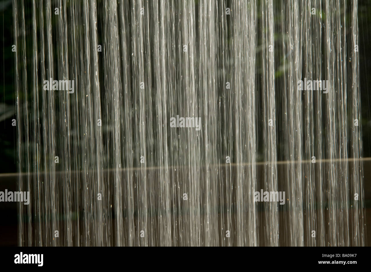 Water streaming down Stock Photo - Alamy