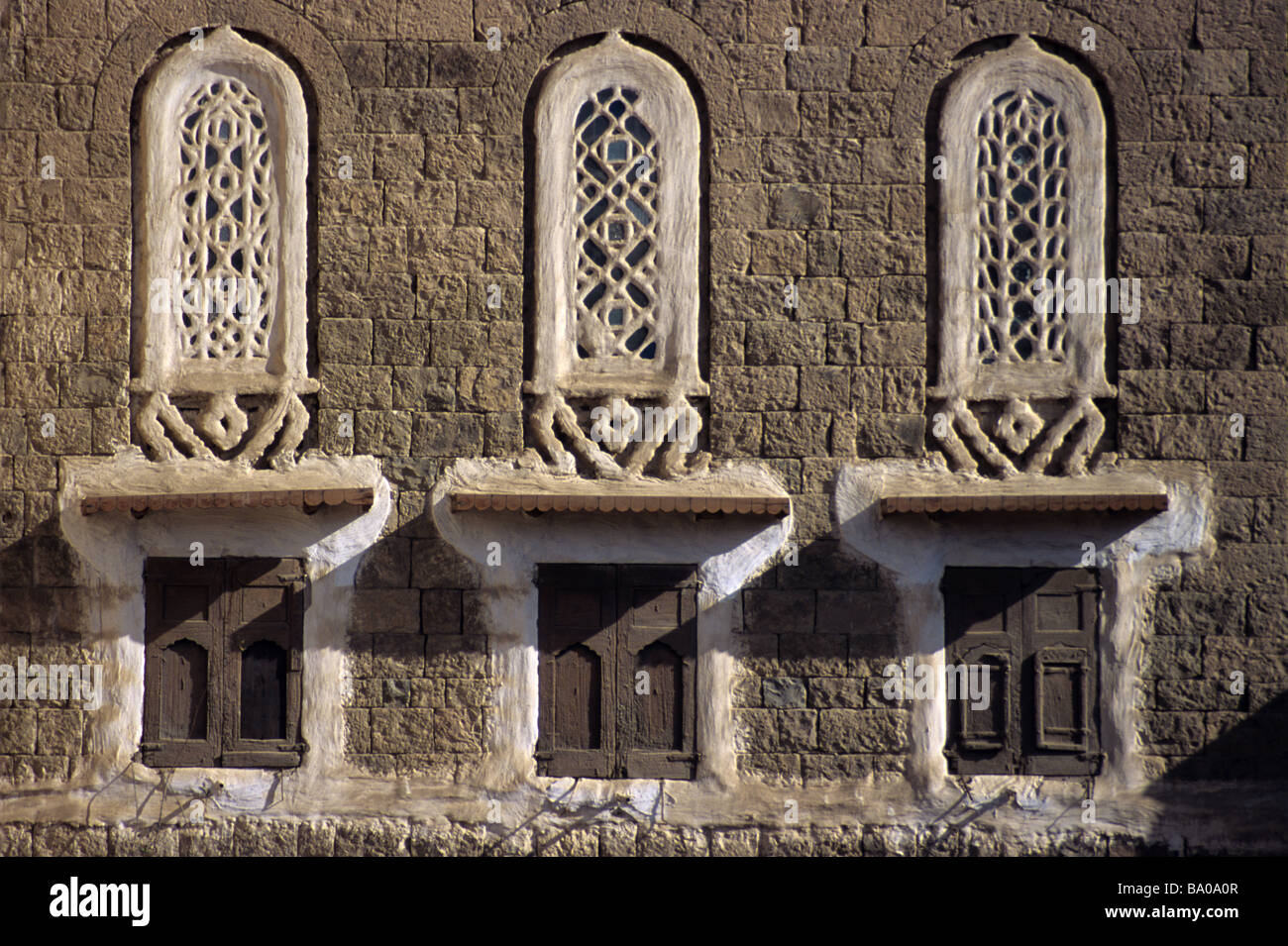 Triple Decorated Windows & Shutters of an Adobe Mud Brick Tower House ...