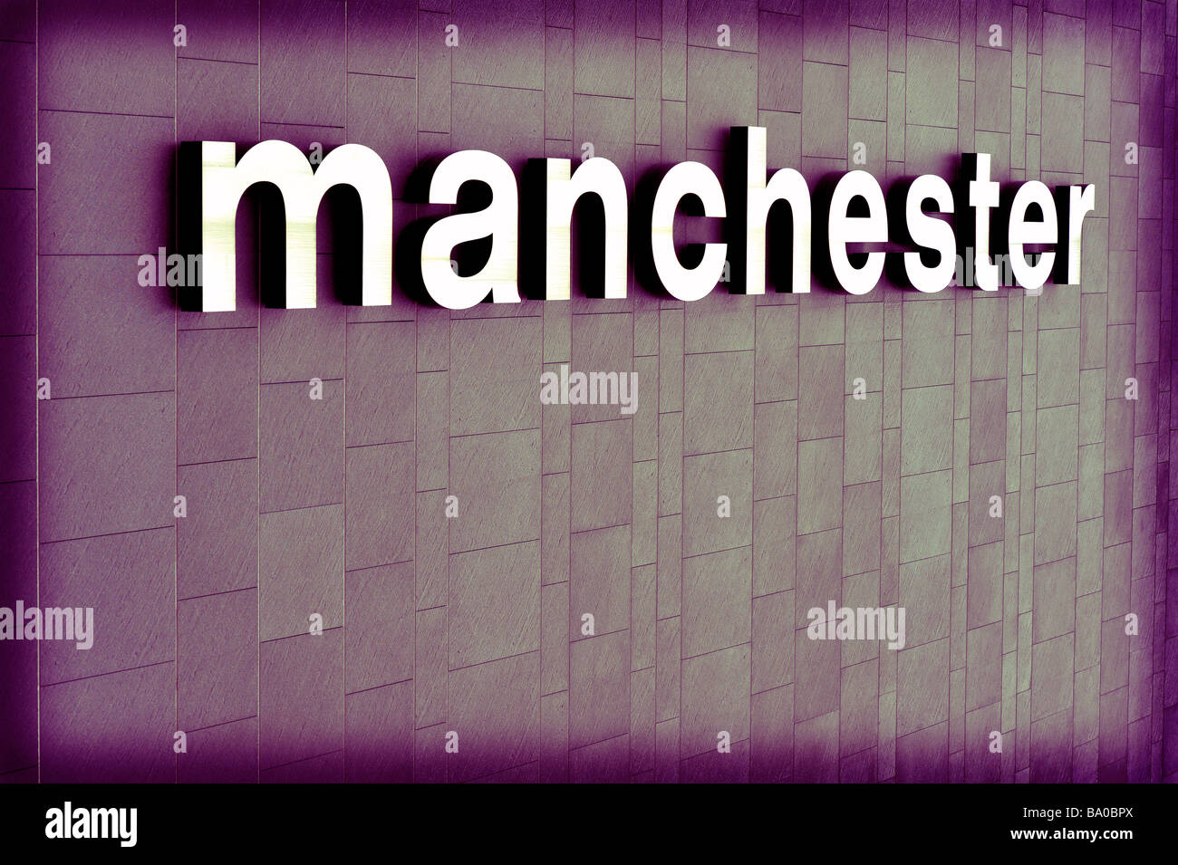 manchester silver sign grey wall Stock Photo - Alamy