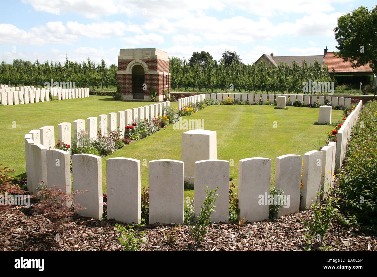 Headstones in the CWGC Perth (China Wall) Cemetery, Zillebeke, Belgium ...