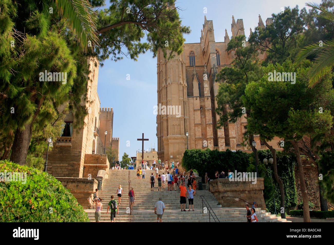Tourists walking up the steps to Palma Cathedral Palma City Mallorca ...
