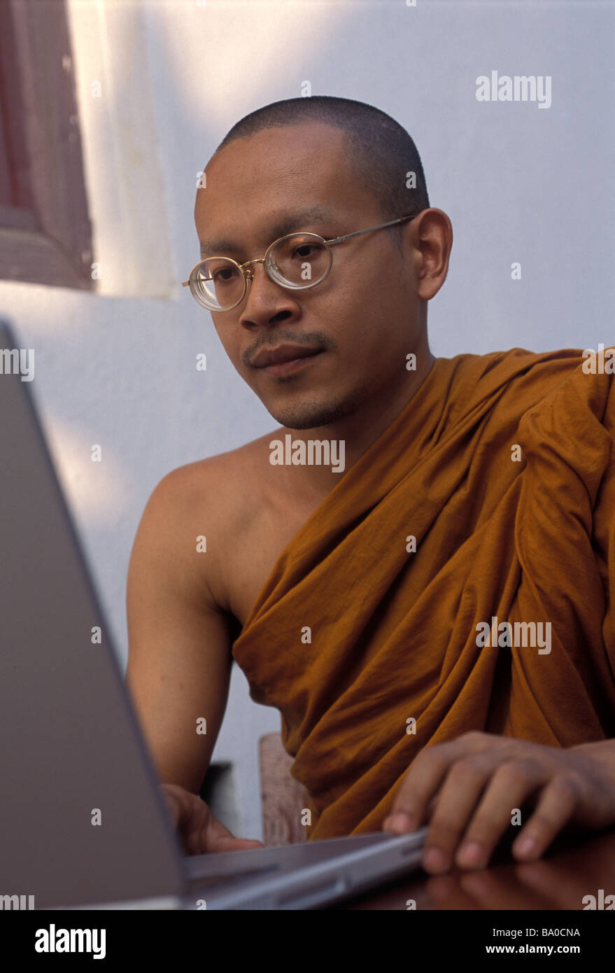 Monk with computer hi-res stock photography and images - Alamy