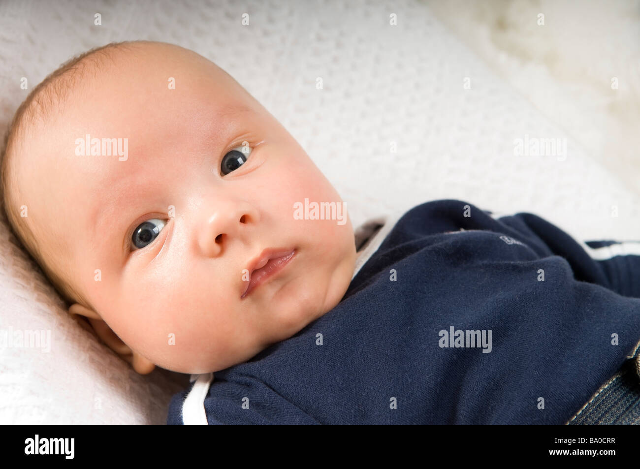 Three month old baby boy posing for the camera Stock Photo - Alamy