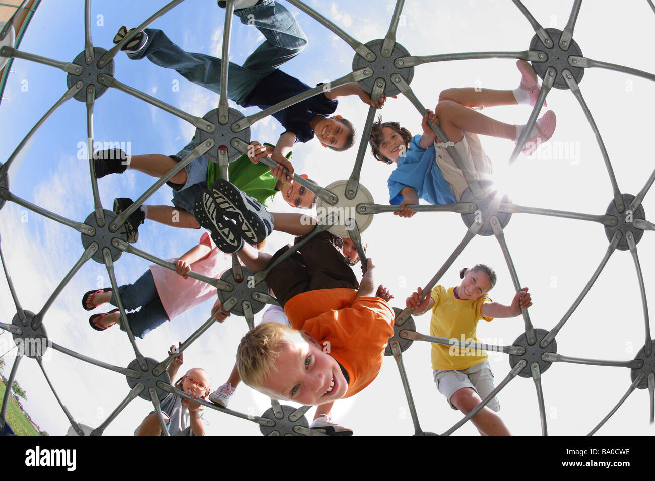 School children on playground structure Stock Photo - Alamy