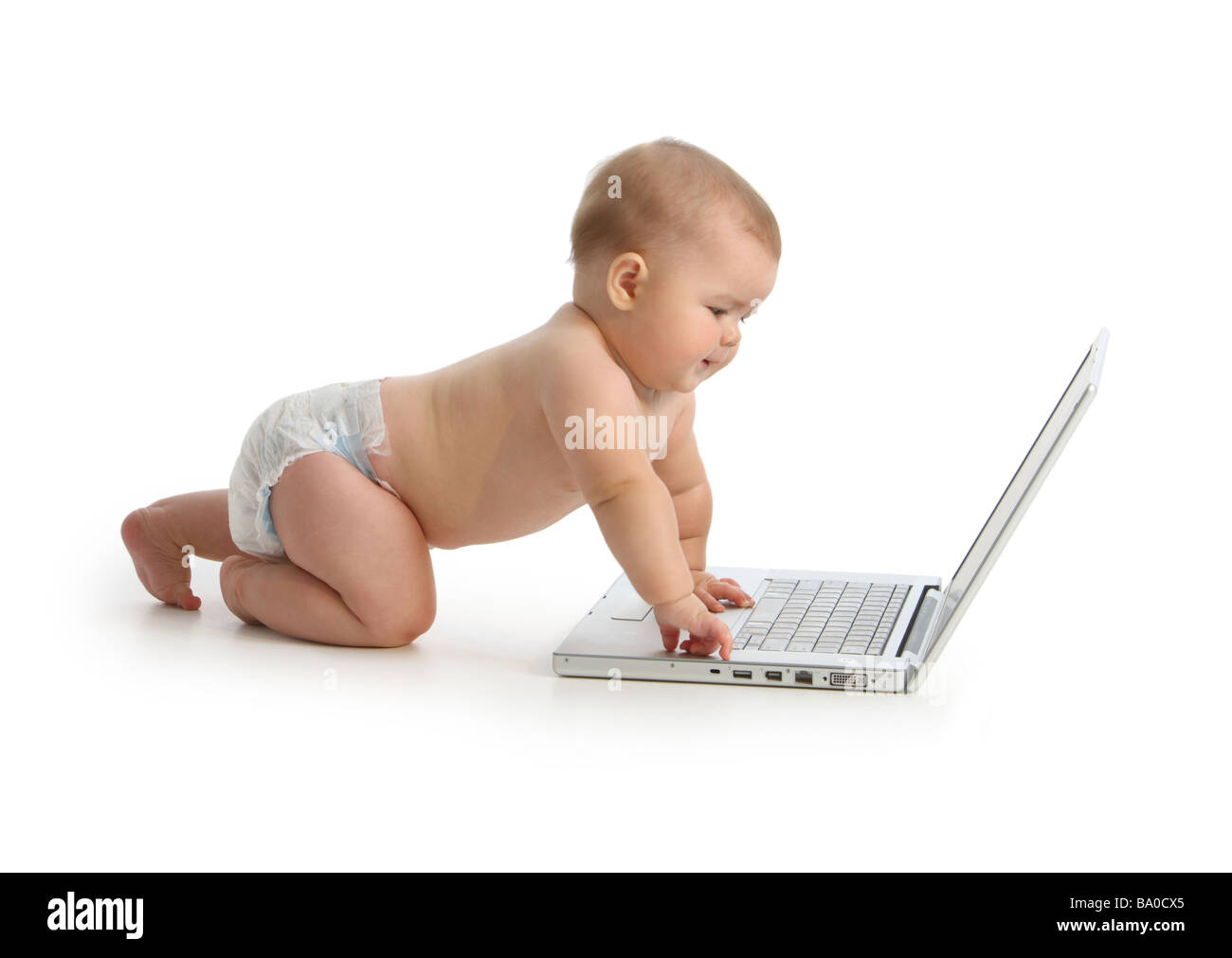 Baby with laptop computer on white background Stock Photo - Alamy