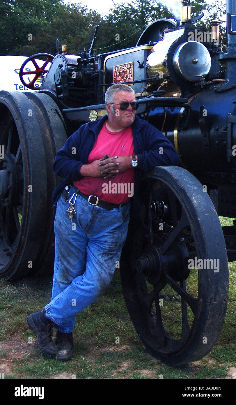 Traditional steam roller engine and driver Stock Photo - Alamy