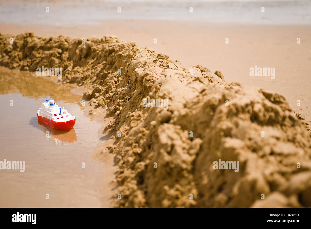 Sand castle on beach with moat hi-res stock photography and images - Alamy