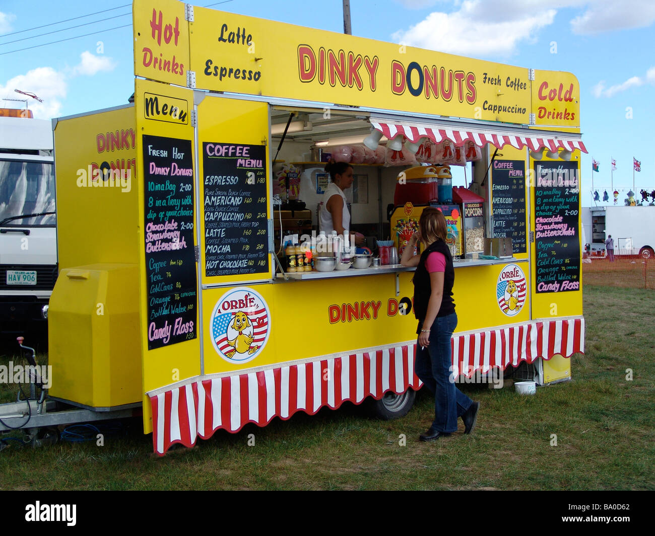 Donut and drinks stall at the fair Stock Photo - Alamy