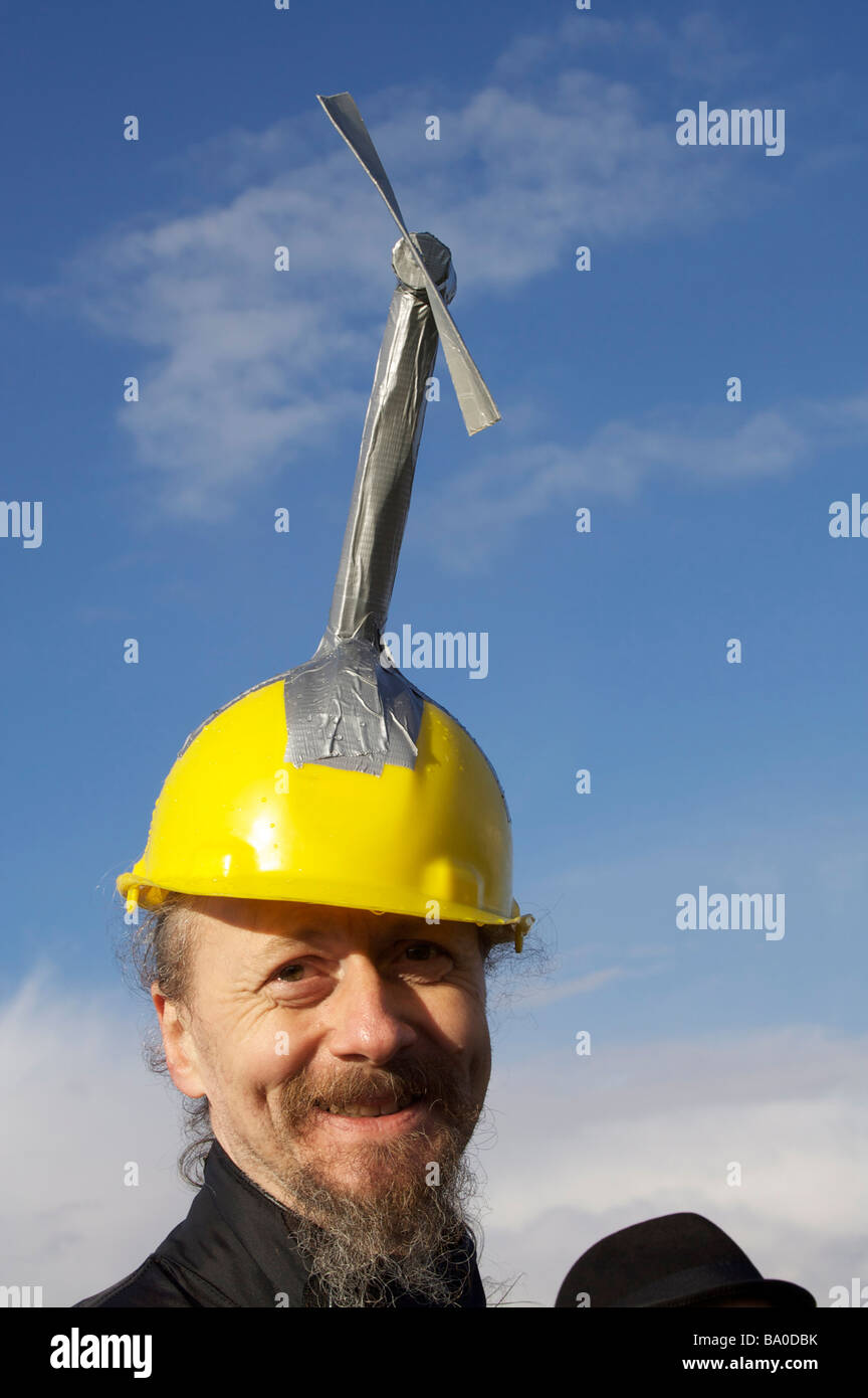 Man with wind vane on his head Stock Photo - Alamy