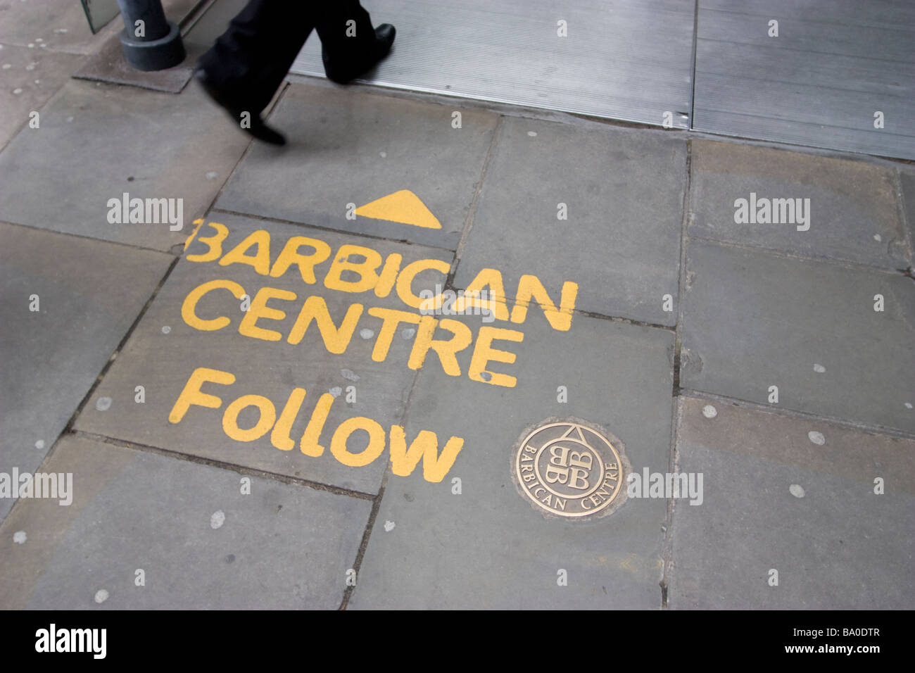 follow pavement sign to barbican centre Stock Photo - Alamy