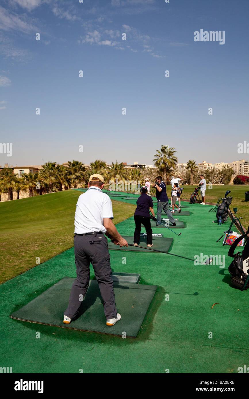 golfers on driving range, Katameya Heights golf course, New Cairo ...