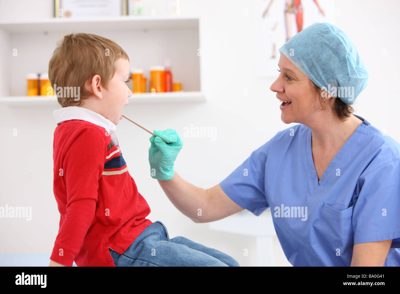 Young boy getting medical checkup Stock Photo - Alamy