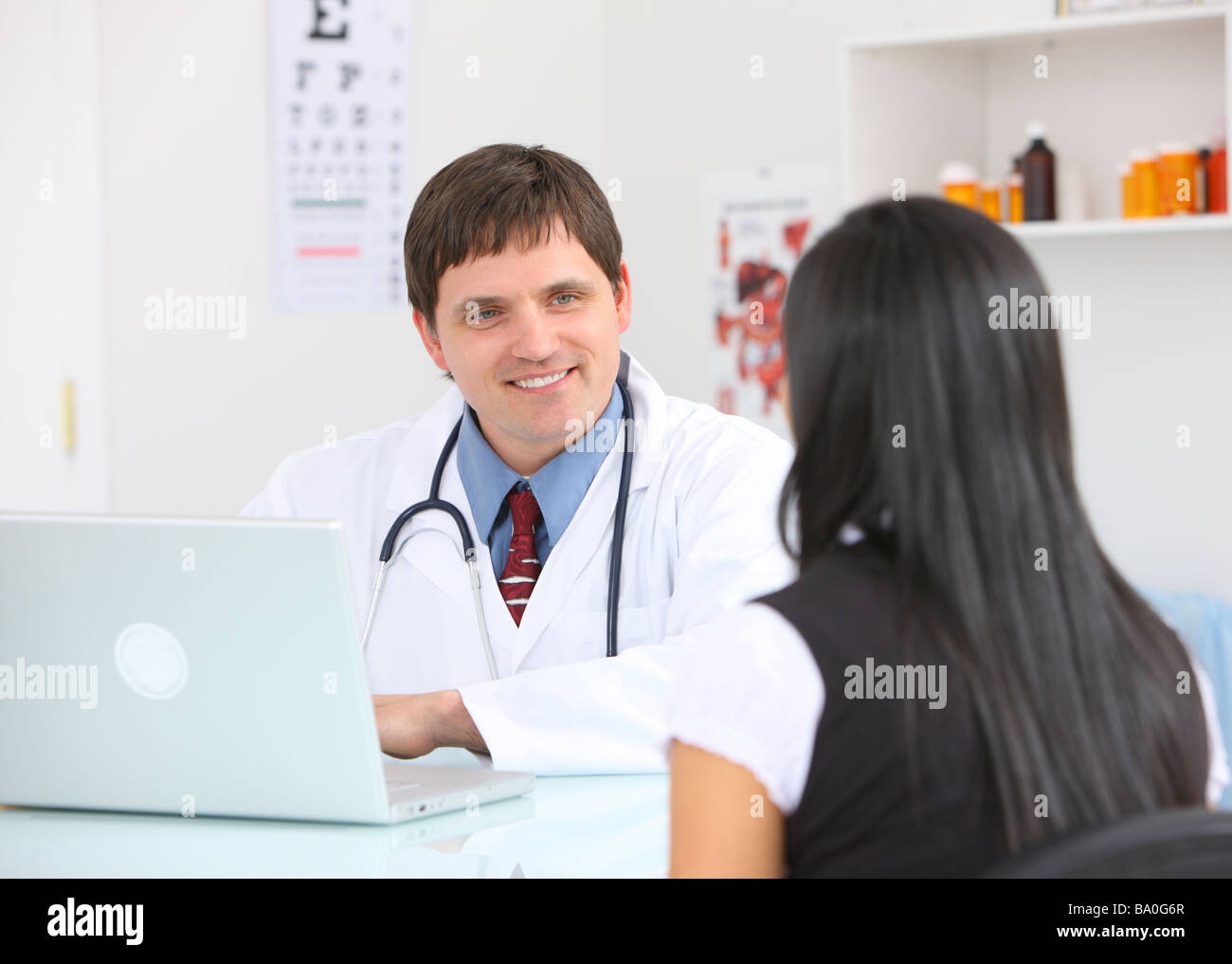 Doctor consulting with patient hi-res stock photography and images - Alamy