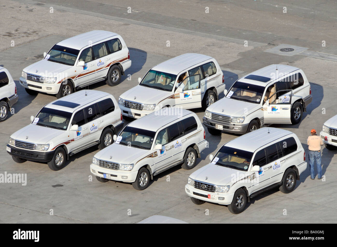 Abu Dhabi port looking down on 4x4 cars awaiting cruise passengers for ...