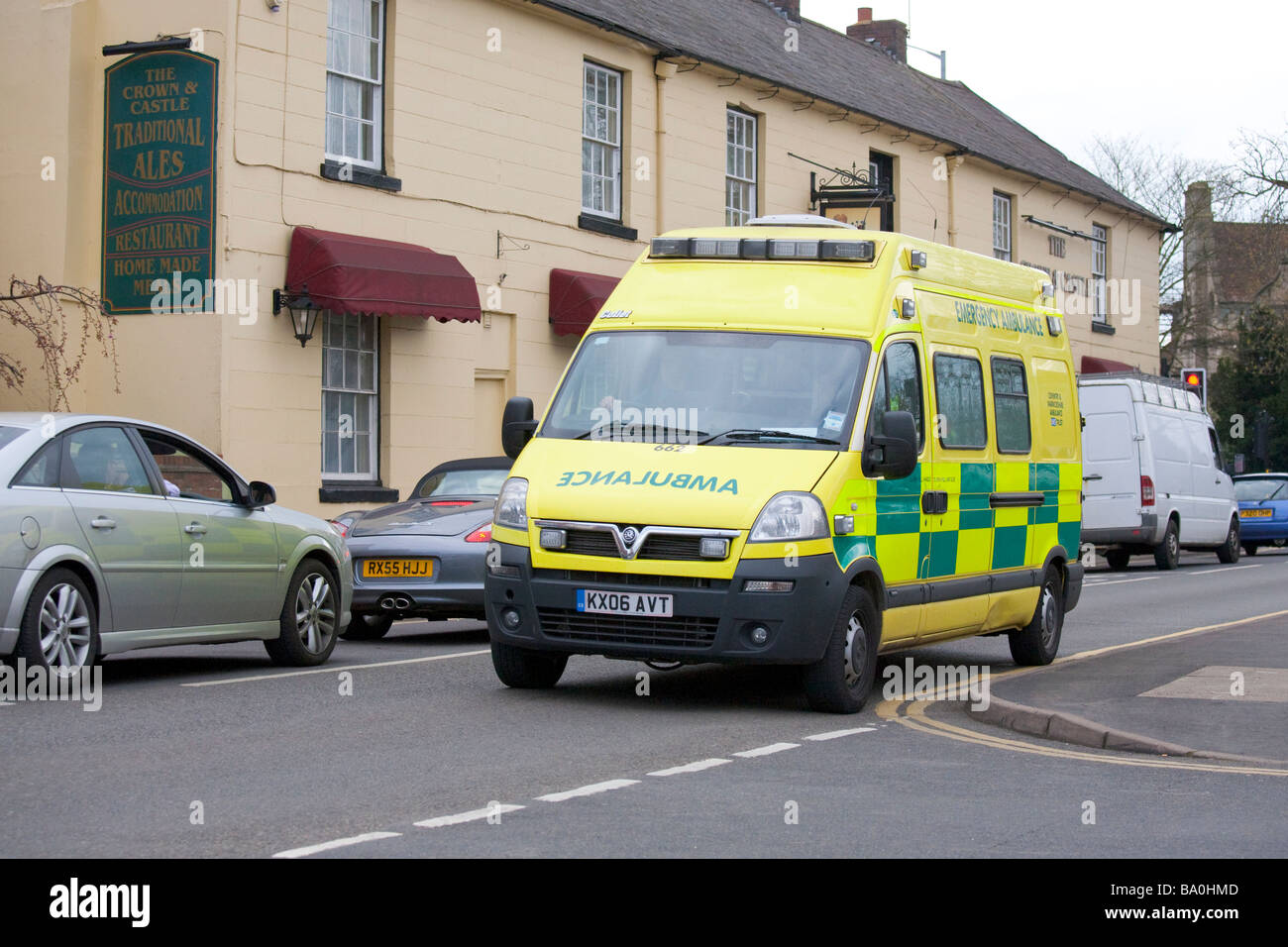 Emergency ambulance travels through Warwick, England, UK on it's way to ...