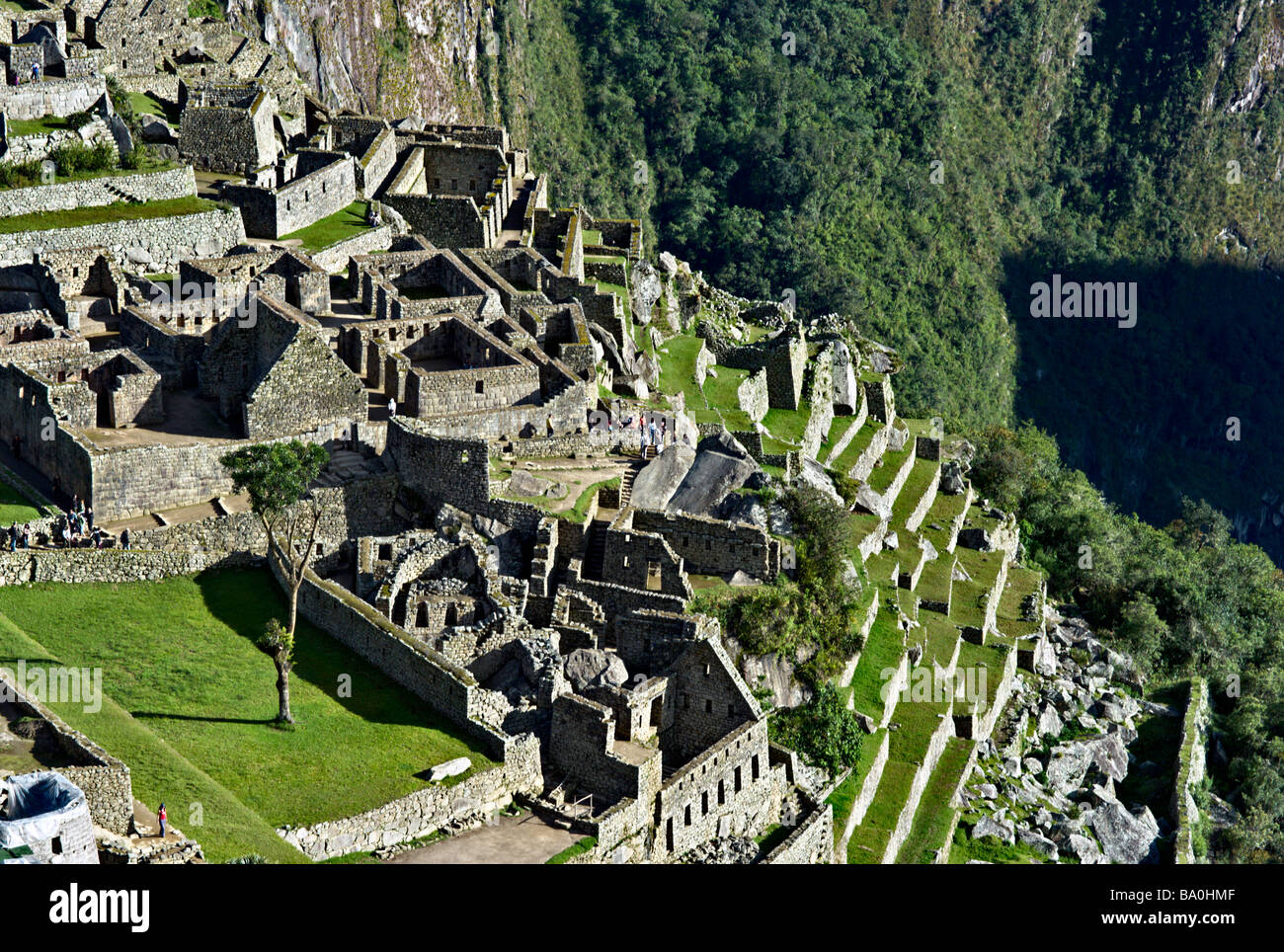 PERU MACHU PICCHU View of Machu Picchu at sunrise just as the sun hits ...