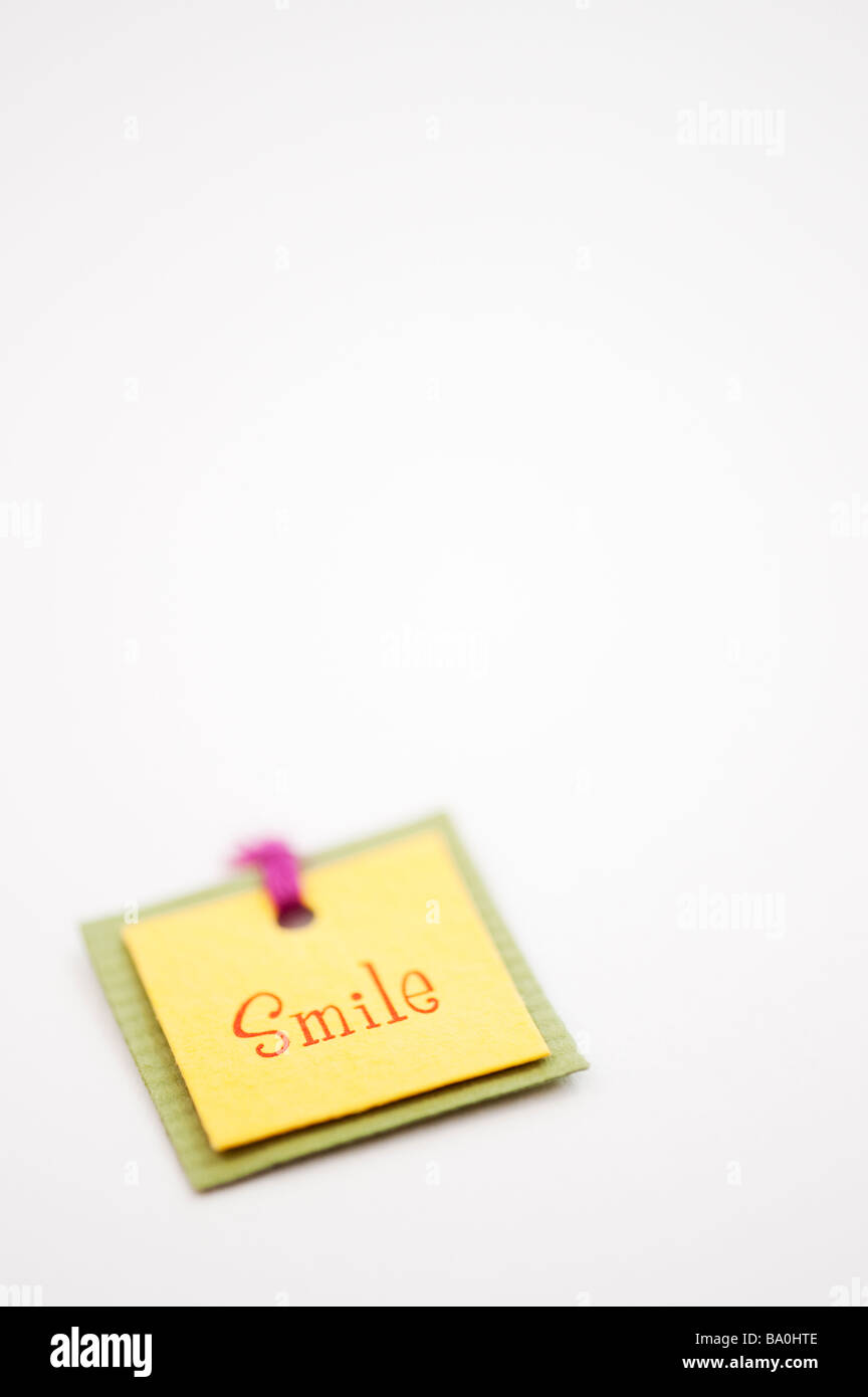 Smile label on white background Stock Photo - Alamy