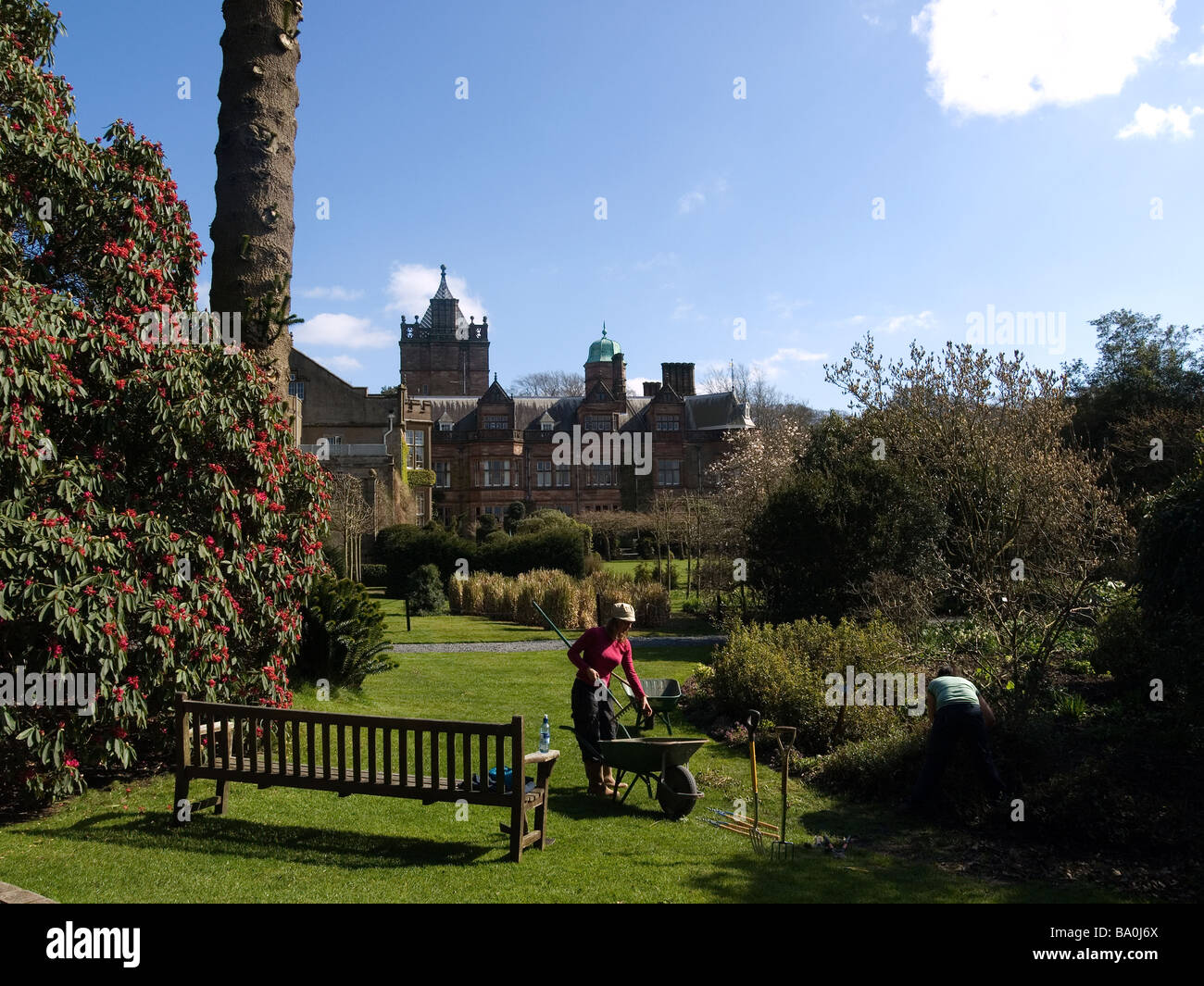 Two women gardeners working in the formal gardens in the estate of ...