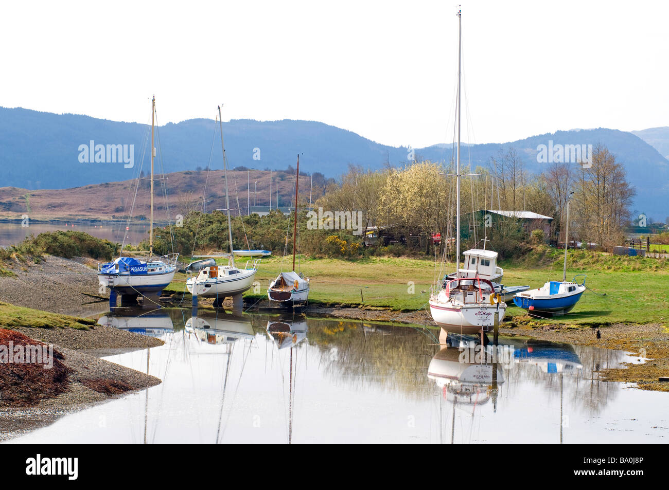 Pleasure boats in a sheltered berth at Loch Carron village in Spring ...