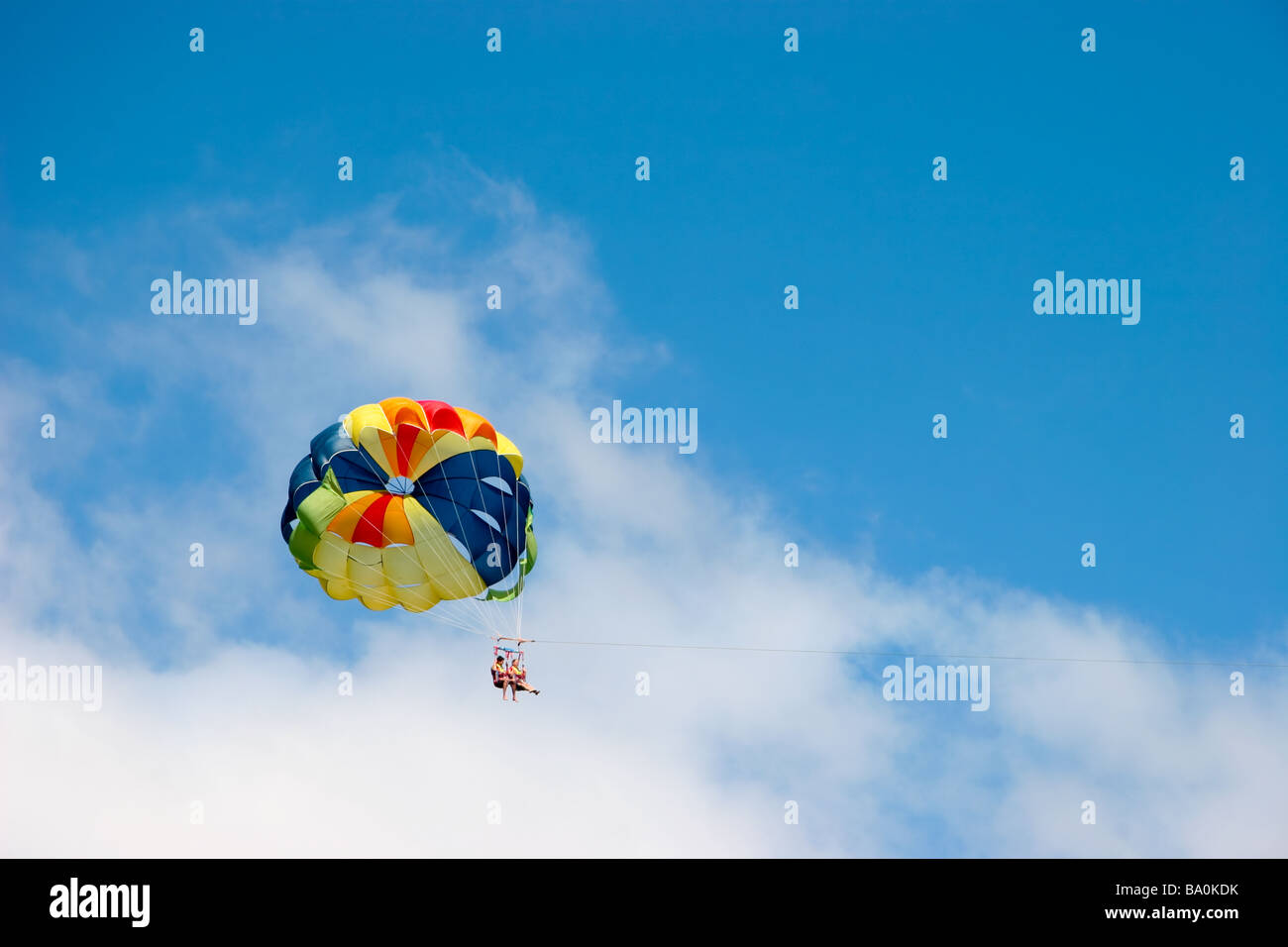 Two people paragliding off a beach in Gran Canaria Stock Photo - Alamy