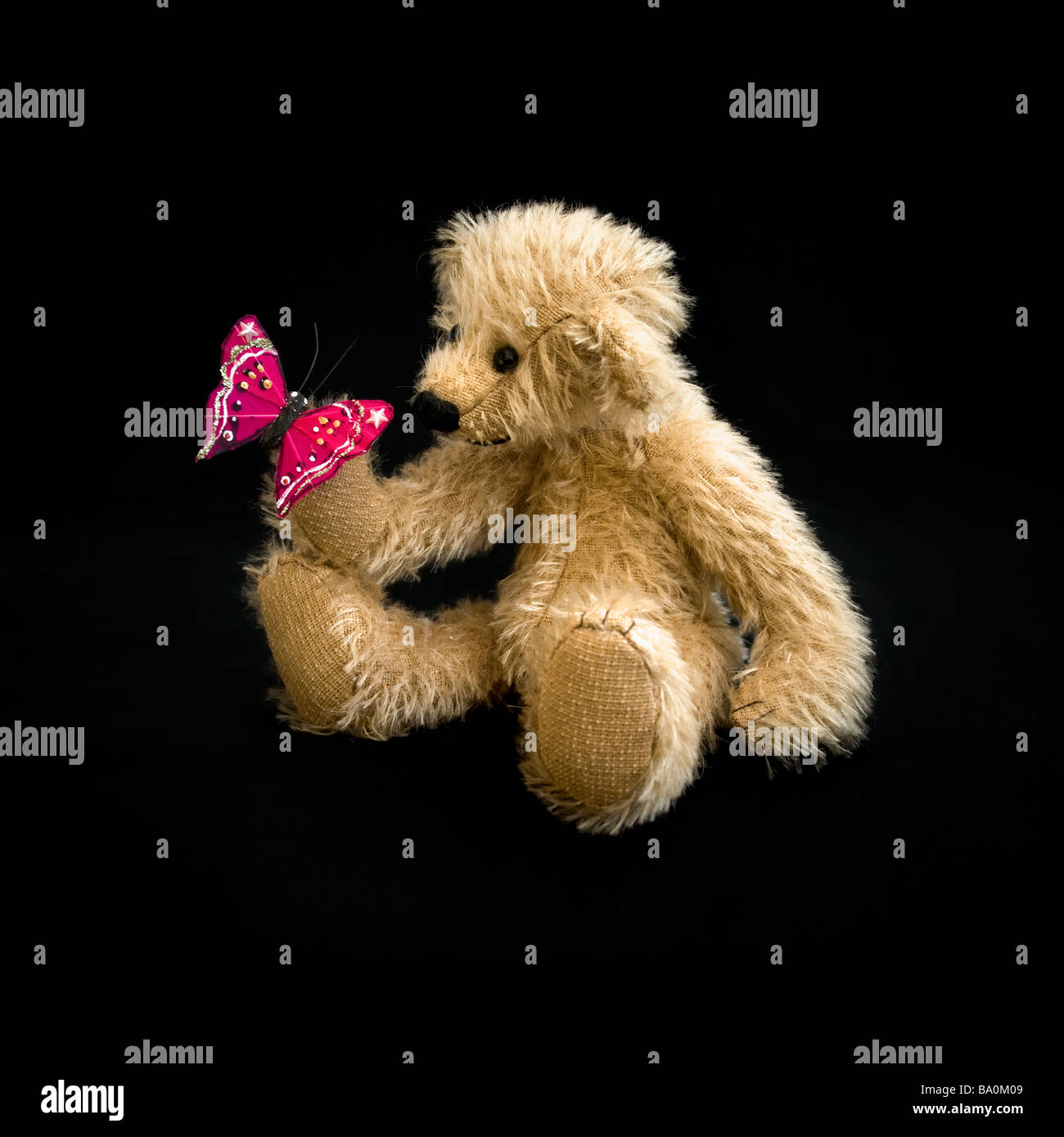 Cute hand made honey coloured teddy bear with black nose and a pink ...