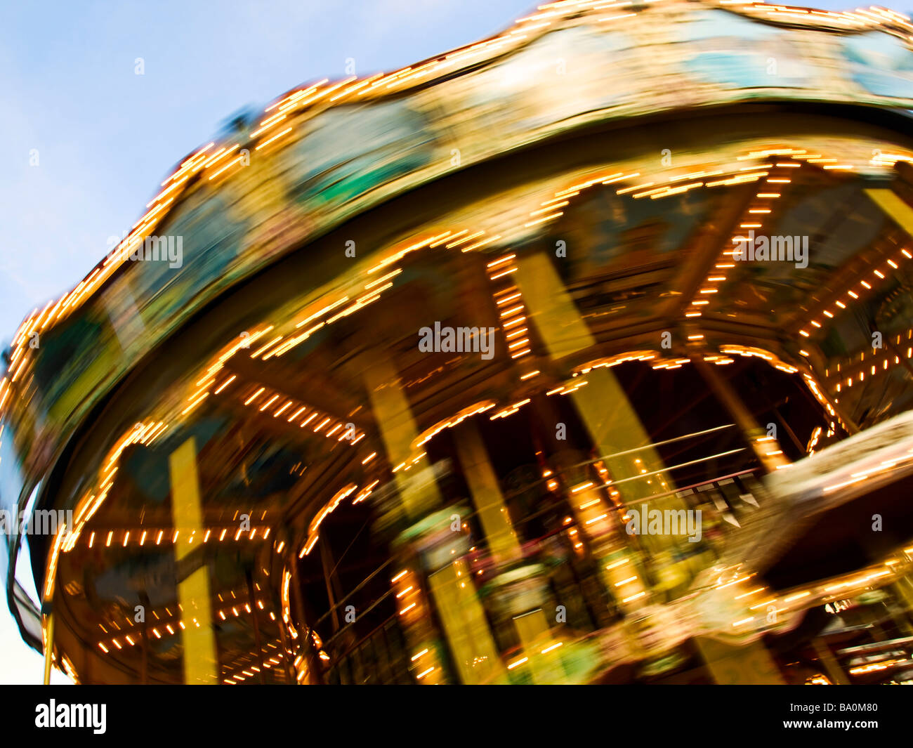 Moving carrousel ride Stock Photo - Alamy