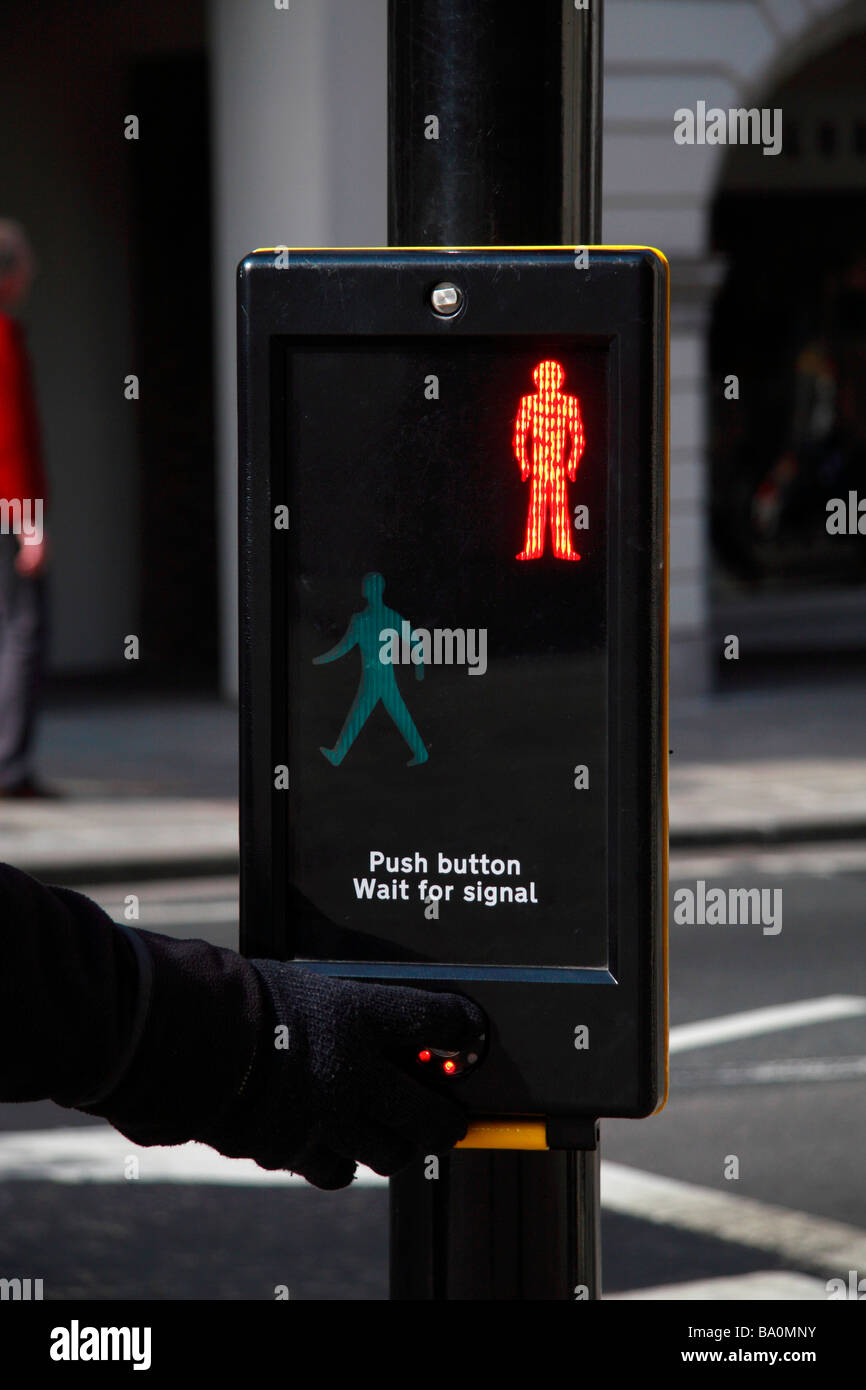 A hand operated pelican crossing at traffic lights in Richmond, Surrey ...