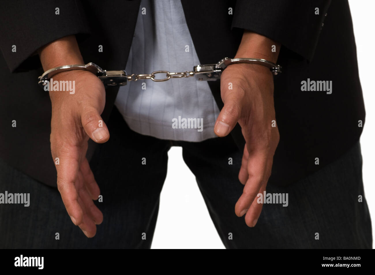 Restrained in handcuffs hi-res stock photography and images - Alamy