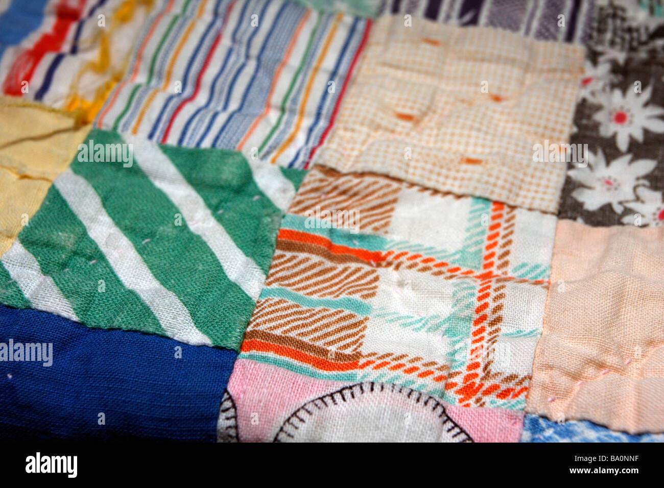 Detail of square patches on patchwork quilt. Crazyquilt Stock Photo - Alamy