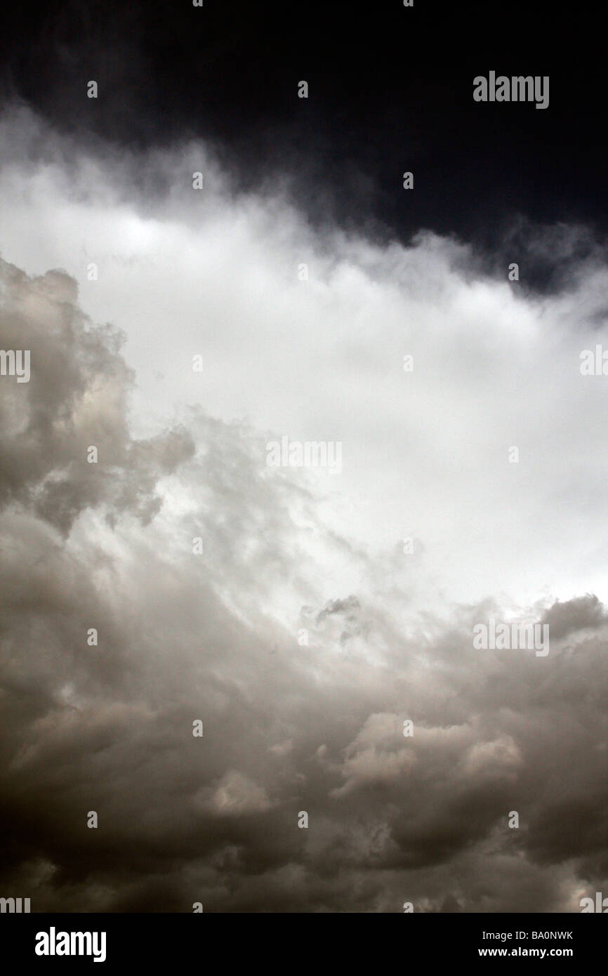 High contrast clouds thunderstorm vertical portrait Stock Photo - Alamy