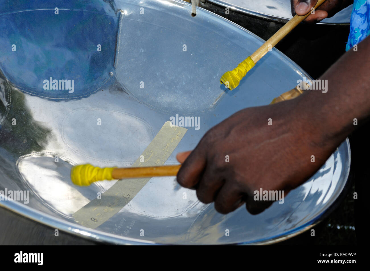 Playing steel drums hi-res stock photography and images - Alamy