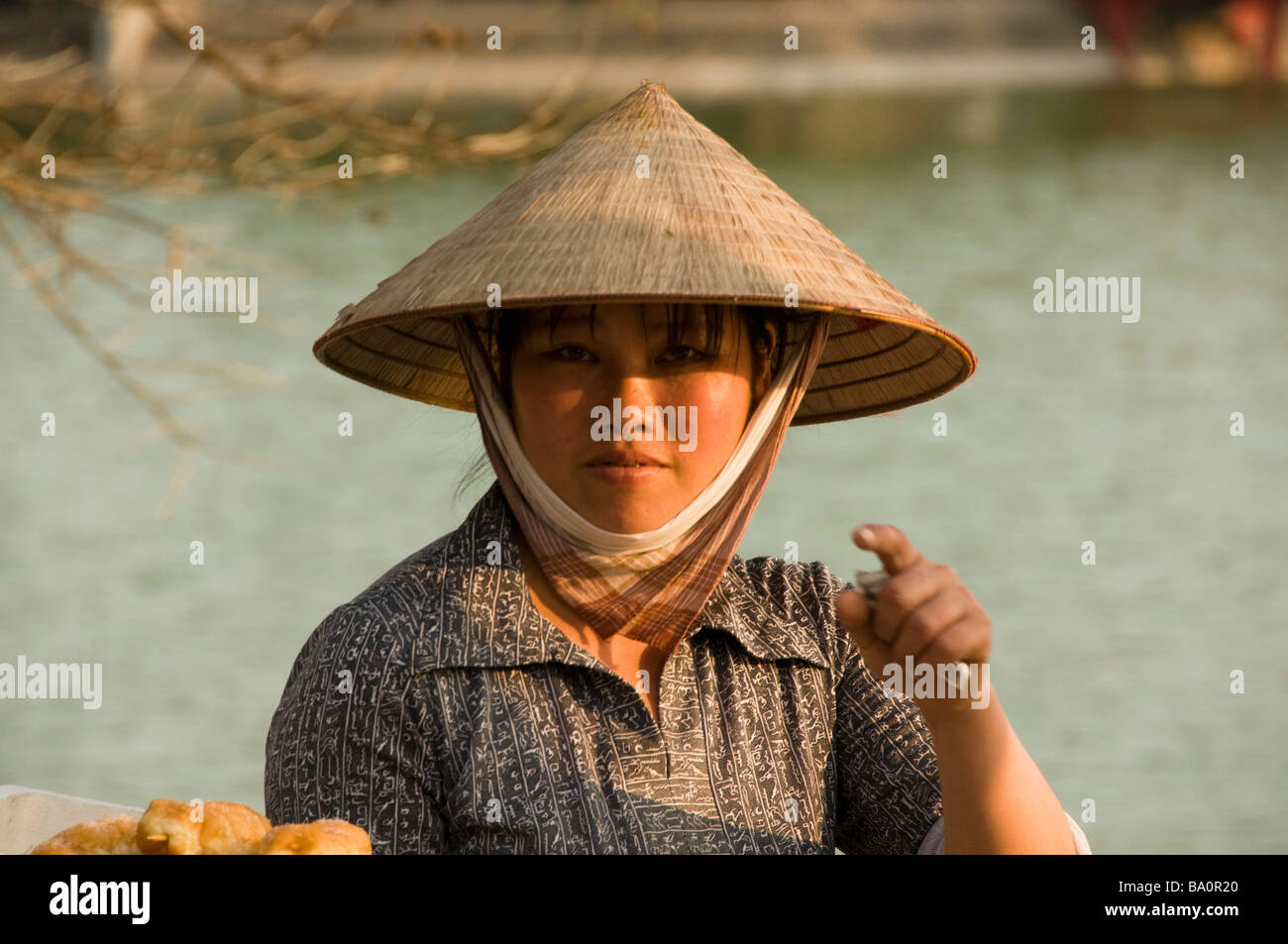 portrait of Vietnamese vendor in Hanoi Stock Photo - Alamy