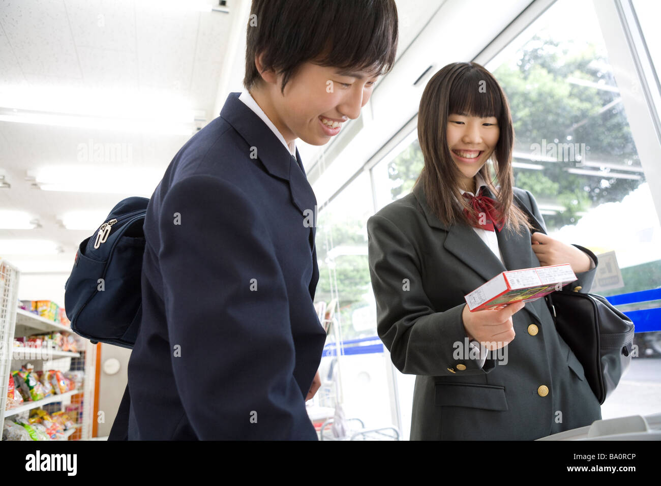 Customer at convenience store Stock Photo - Alamy