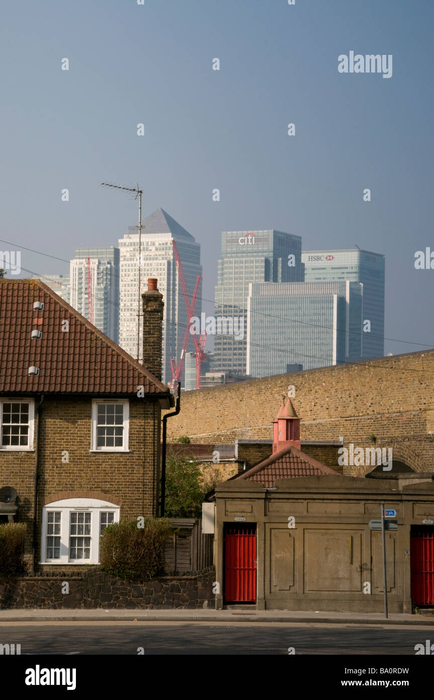 Contrast of small house on the isle of Dogs, with the skyscrapers of ...