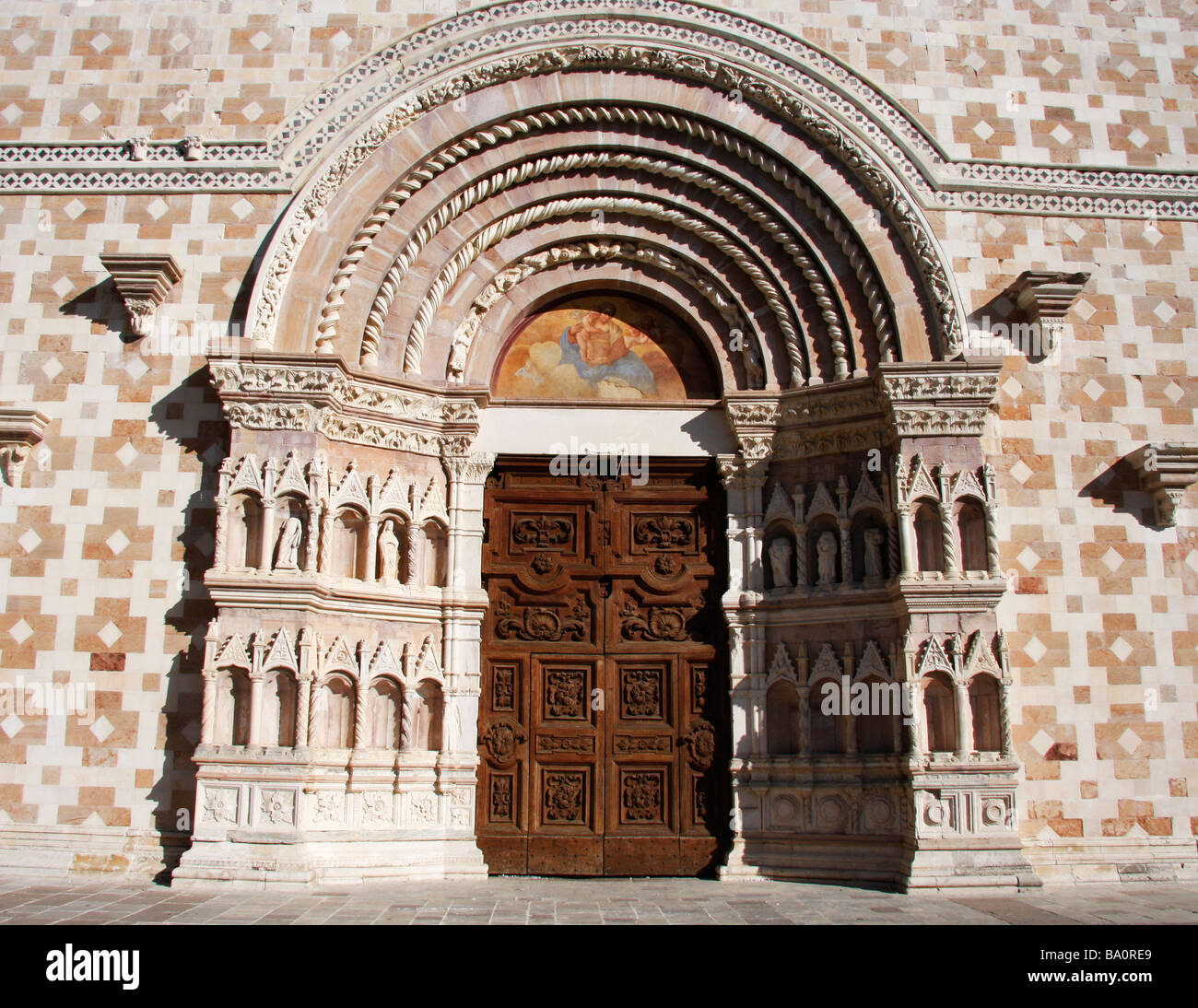 detail of pink and white stone basilica of the 13th century Santa Maria ...