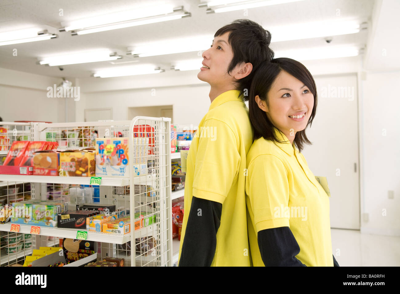 Convenience store clerk Stock Photo - Alamy