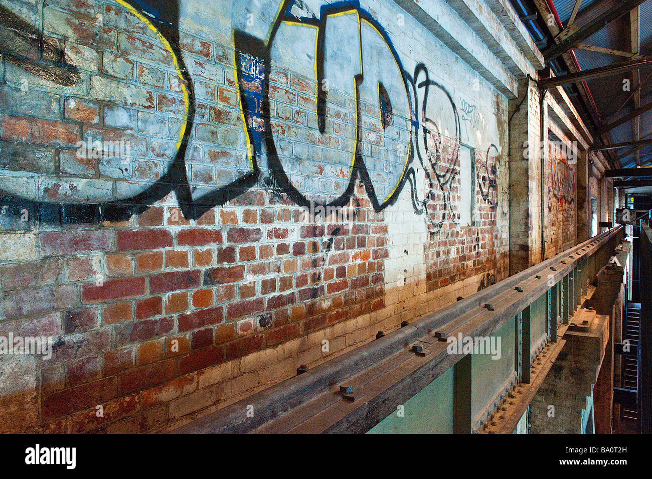 Grafiti on factory wall Stock Photo - Alamy