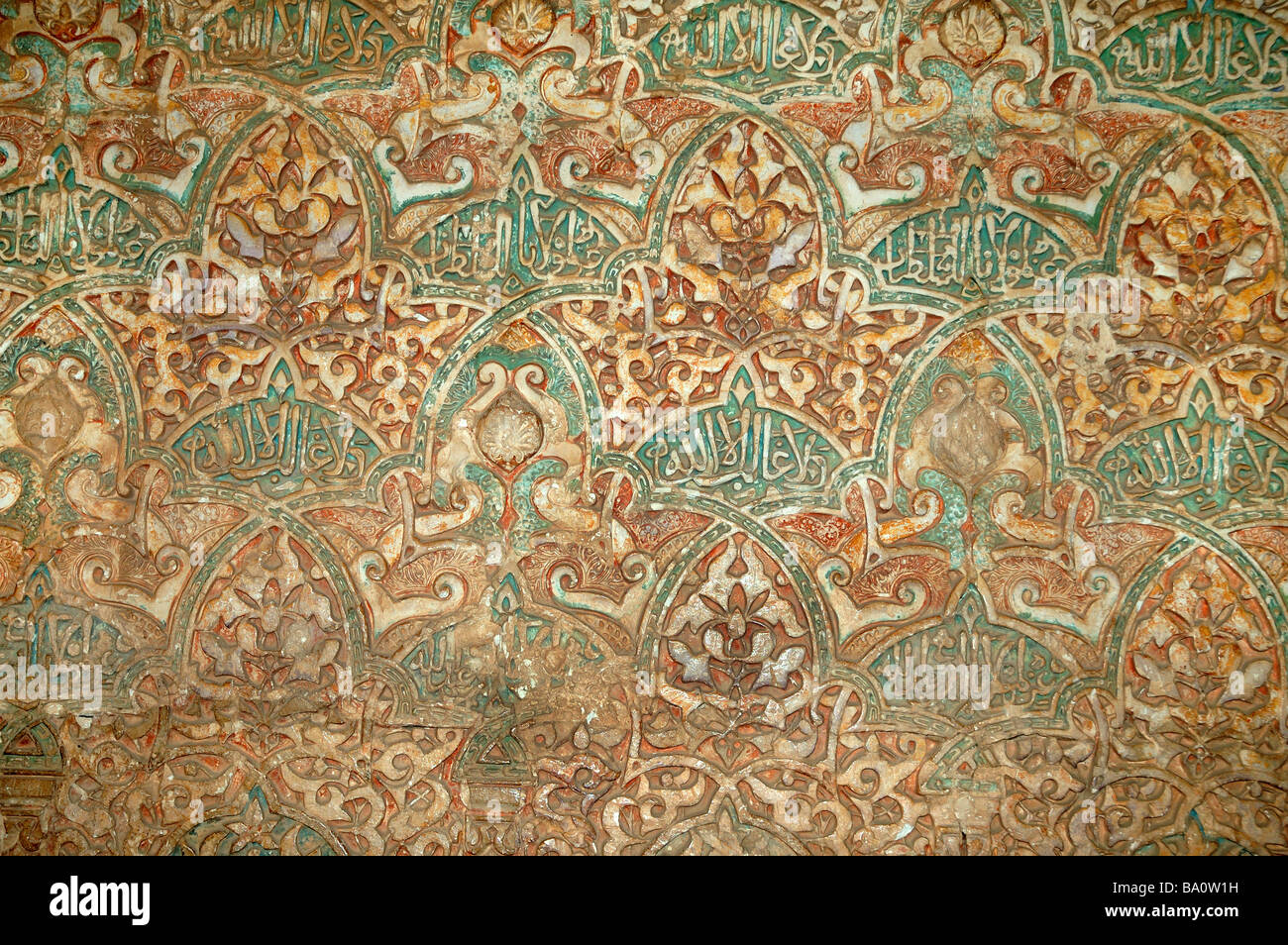 decorated wall at the alhambra showing arabic muslim design details ...