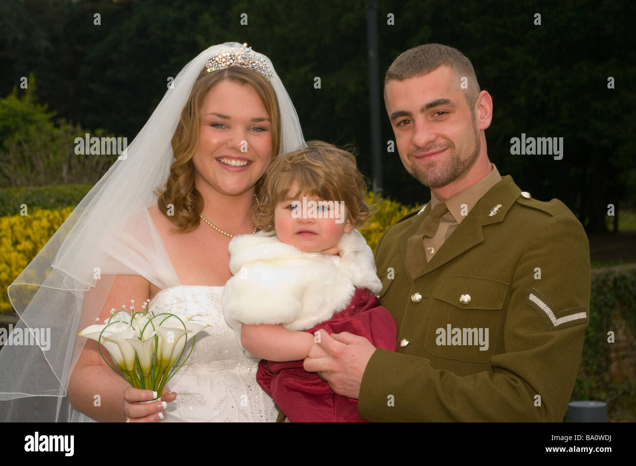 Bride and Groom in Army Uniform military armed forces wedding with ...