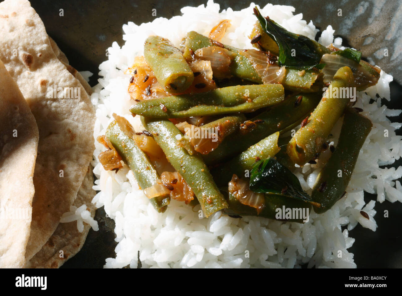Chikkudu Kaaya Vepudu is a Indian broad beans fry from andhra Stock ...