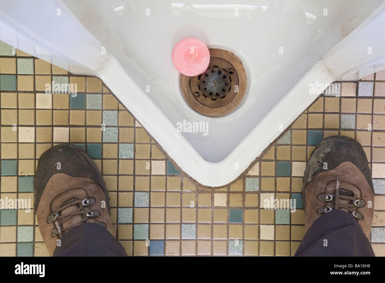 Standing at a Urinal Stock Photo - Alamy