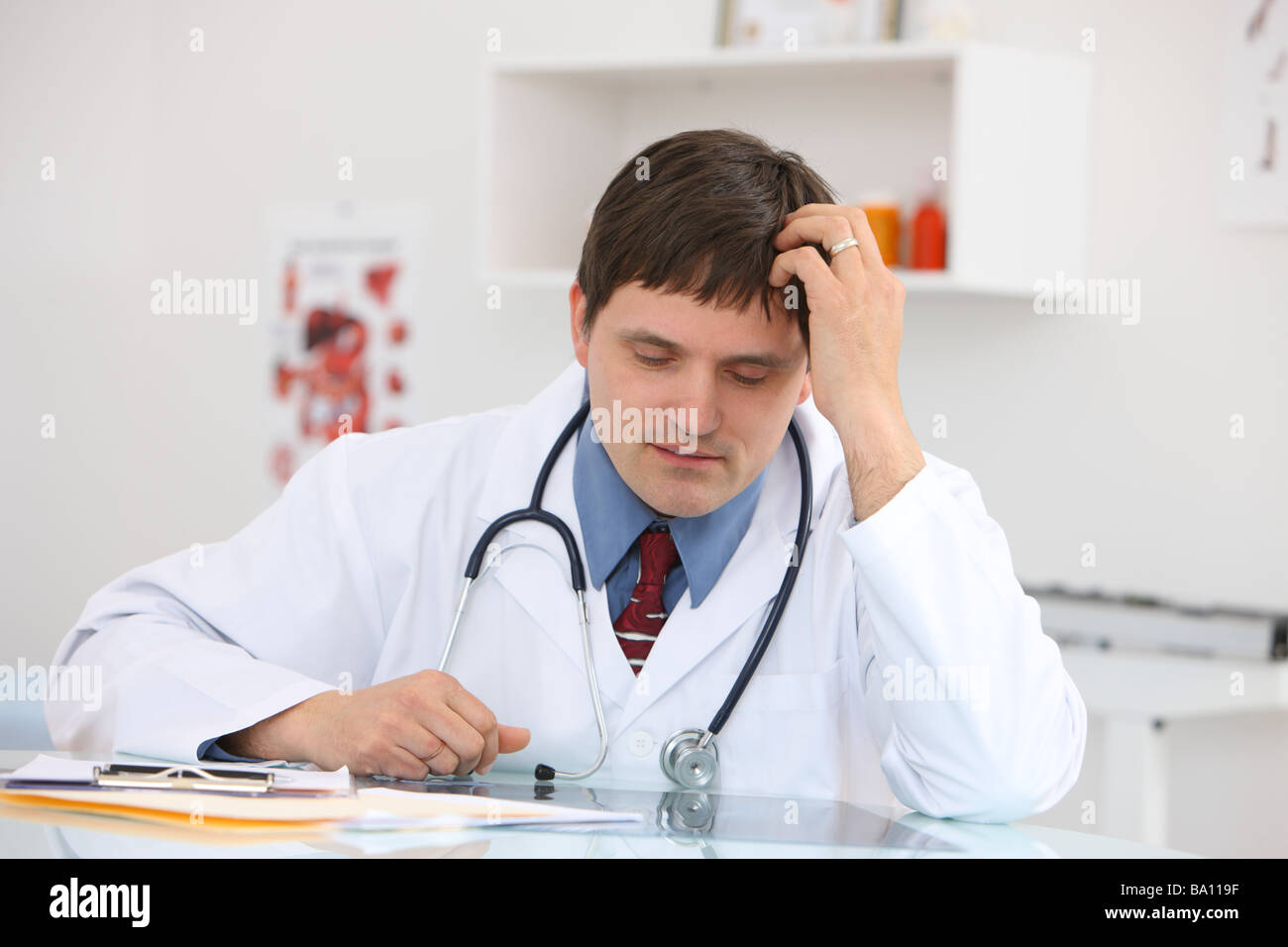 Stressed doctor hi-res stock photography and images - Alamy